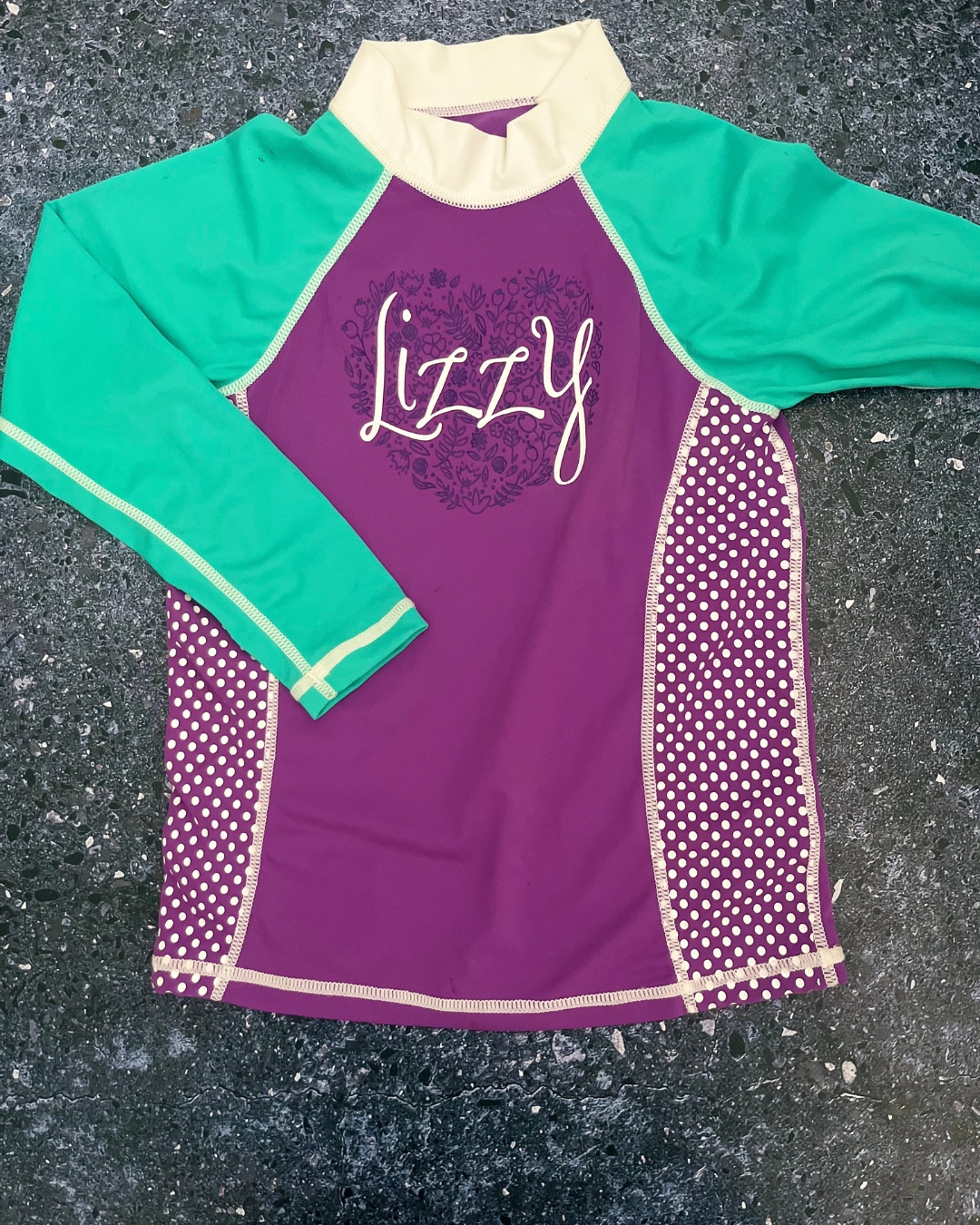 Lizzy purple and green rash vest 4/5Y – Nearly New Kids